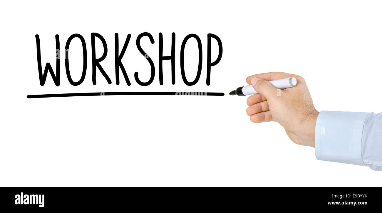 Hand with pen writing the word Workshop Stock Photo - Alamy