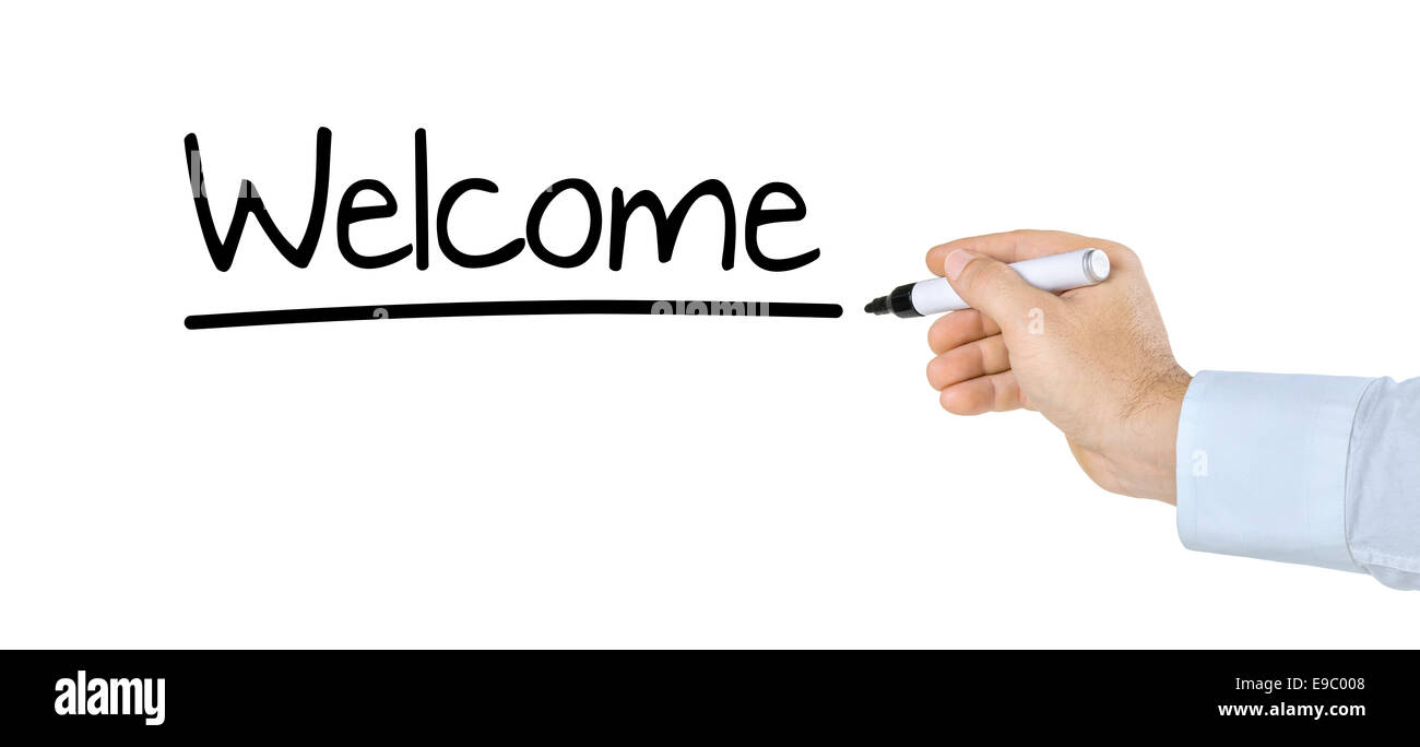 Hand with pen writing Welcome Stock Photo - Alamy