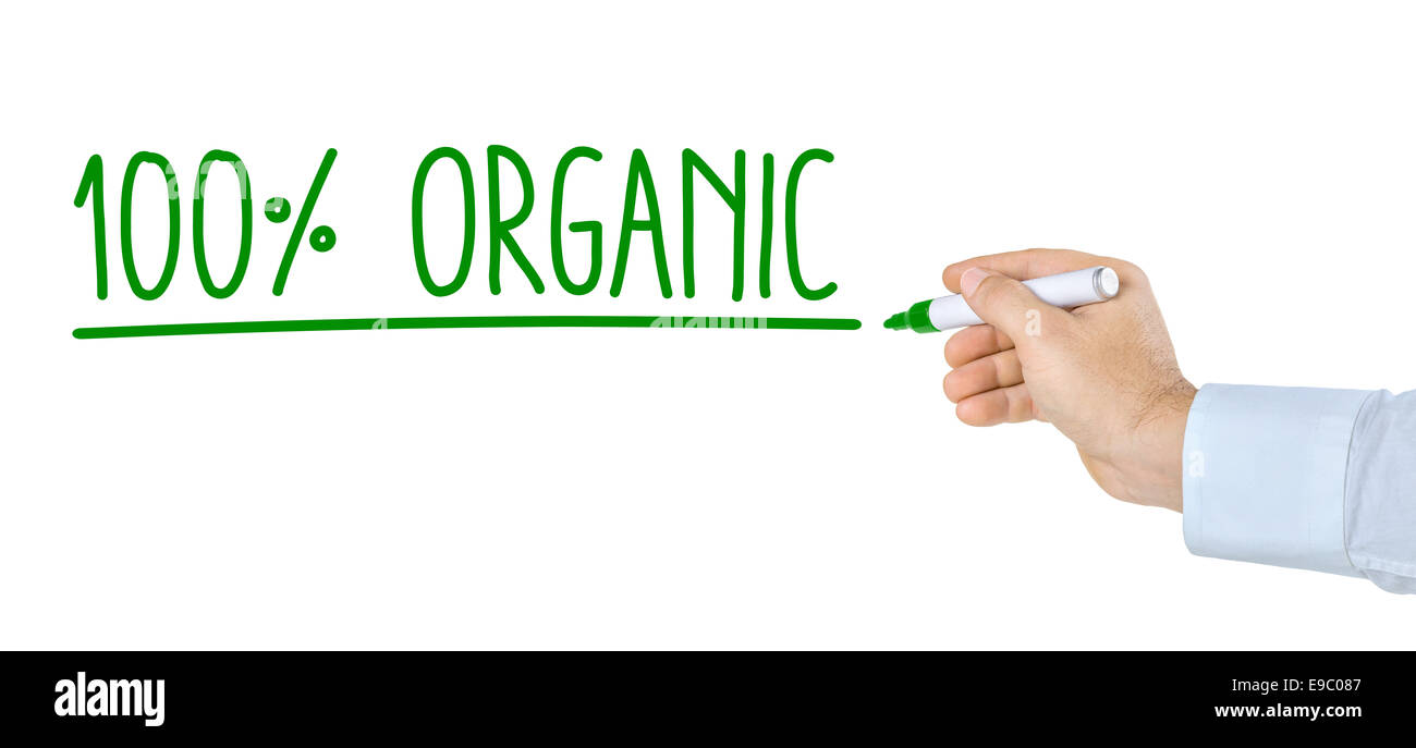 Hand with pen writing 100 percent organic Stock Photo - Alamy