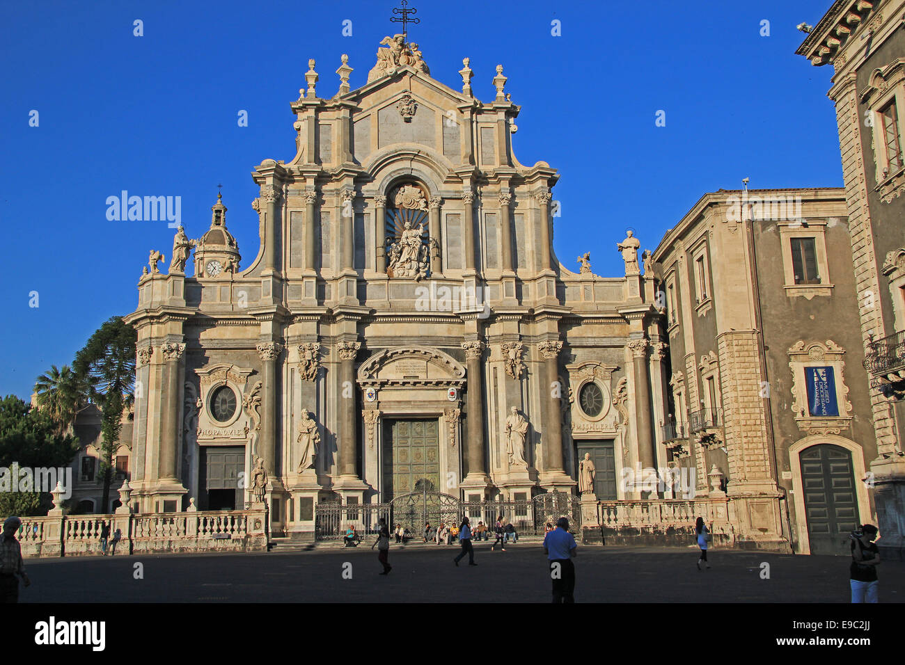 The immense baroque building of the cathedral (dome) in Catania is one ...