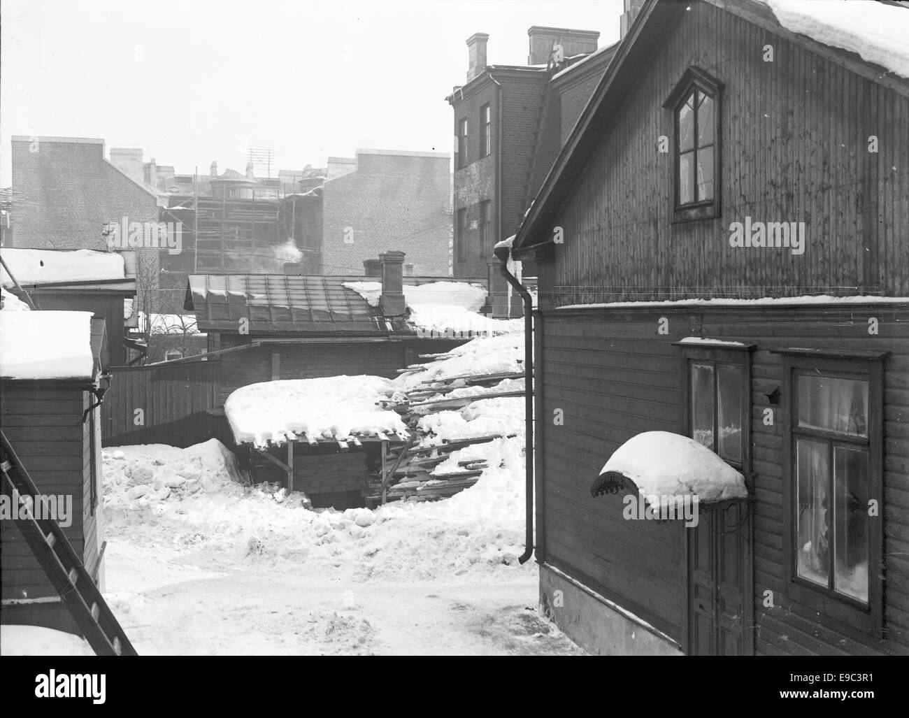 A winter scene from a backyard in Helsinki, photographed between 1890 ...