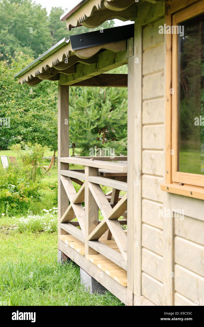 Summer wooden lodge with a terrace and an internal courtyard Stock ...