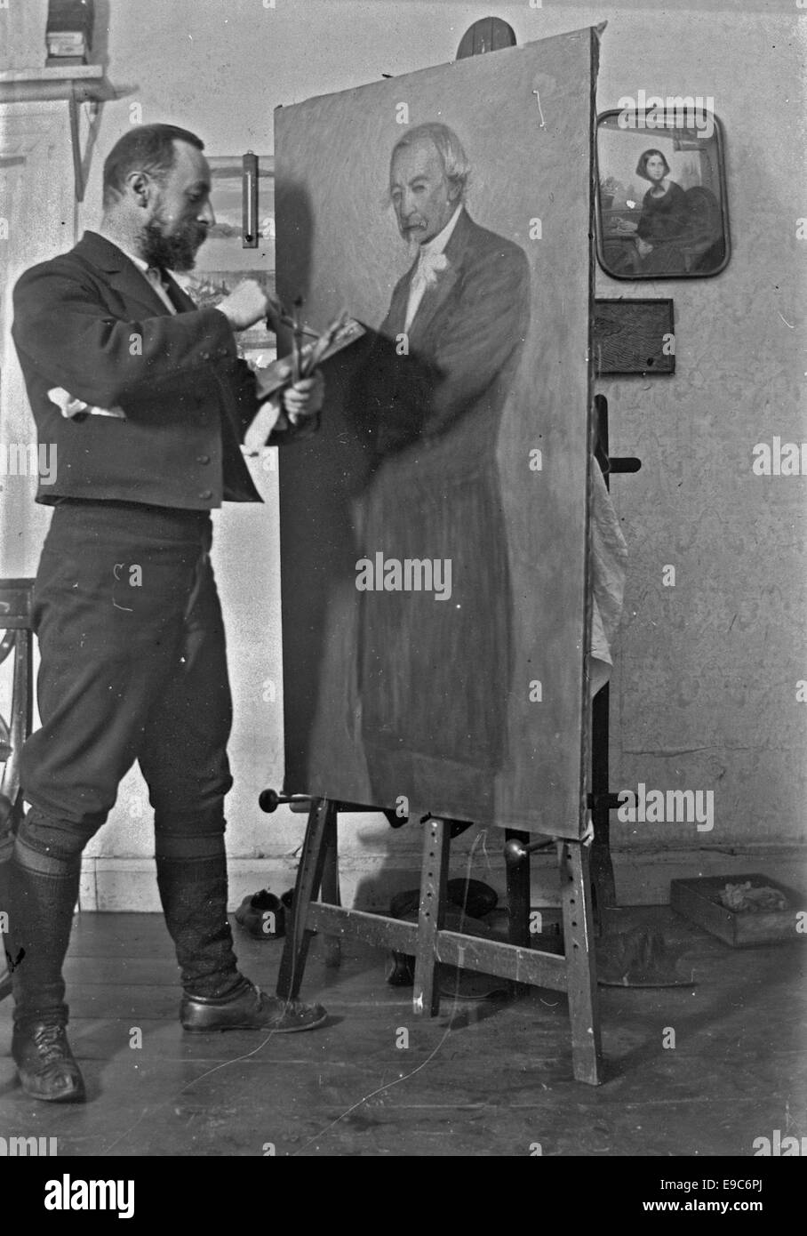 J.A.G. Acke working an a portrait of Topelius Stock Photo - Alamy