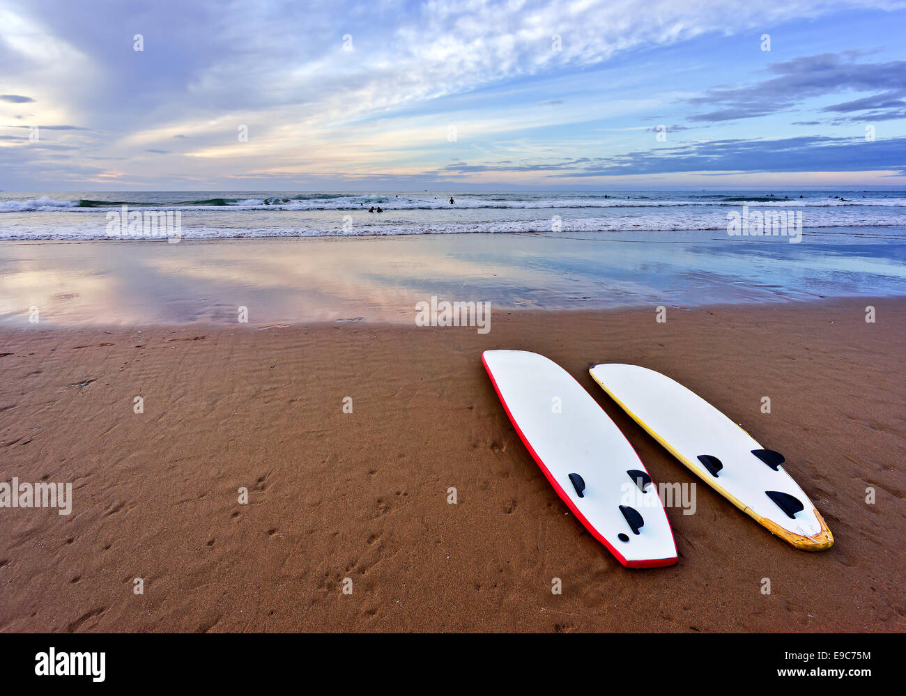 surf boards lying on the beach Stock Photo - Alamy