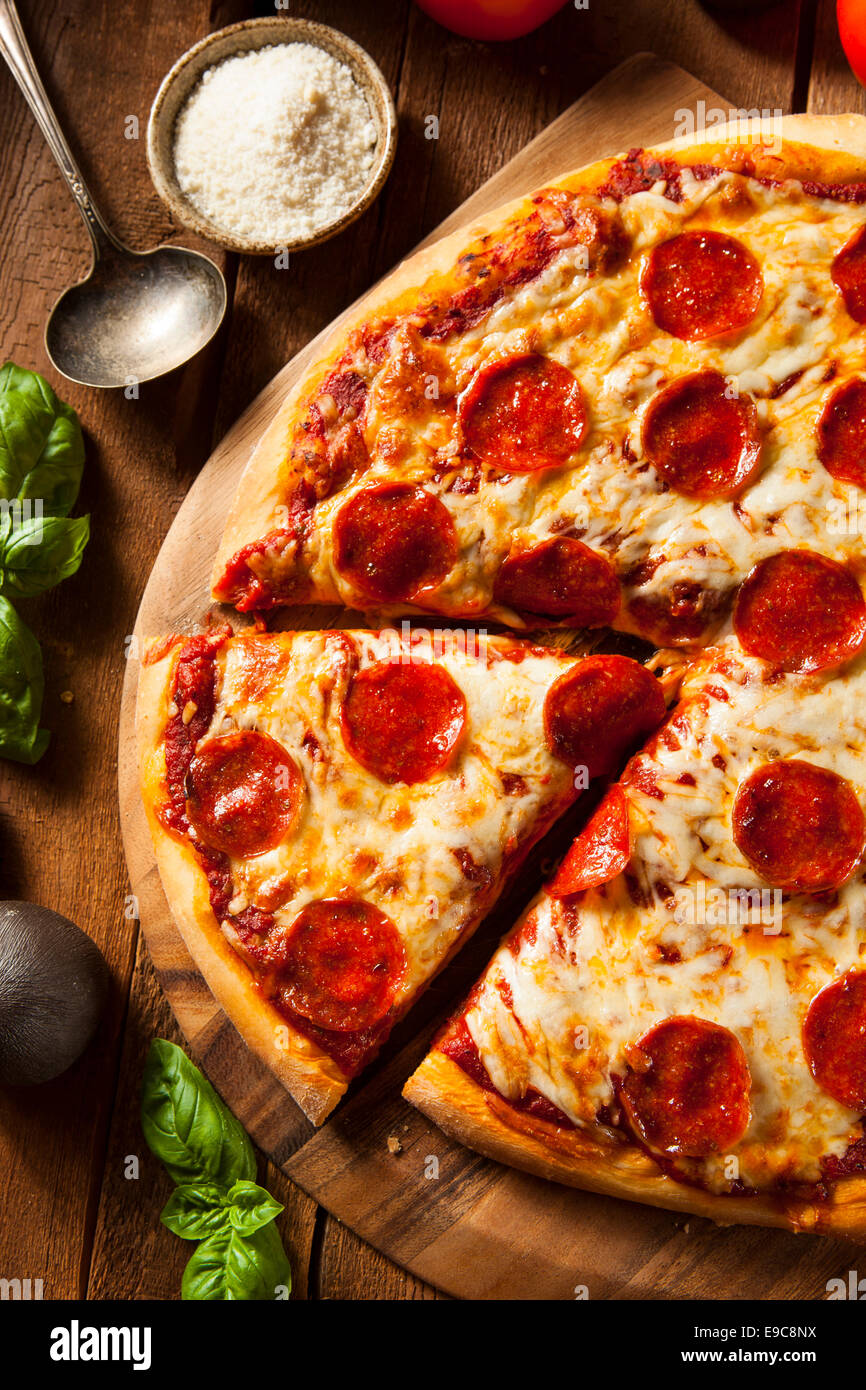 Eating pepperoni pizza hi-res stock photography and images - Alamy