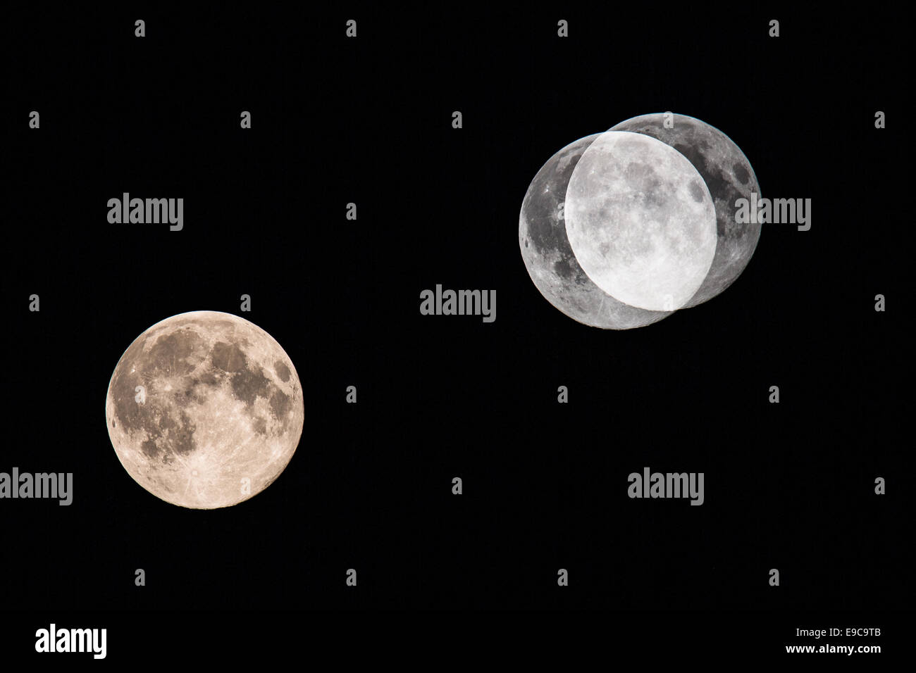 Big moon on dark night sky (multiple exposure showing the progression ...