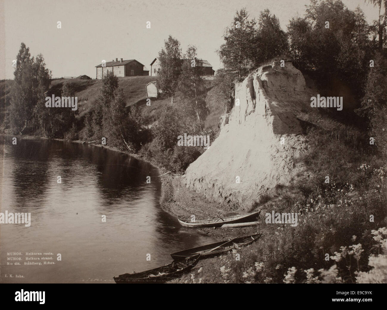 This image showcases a tranquil Finnish coastline, featuring a body of ...