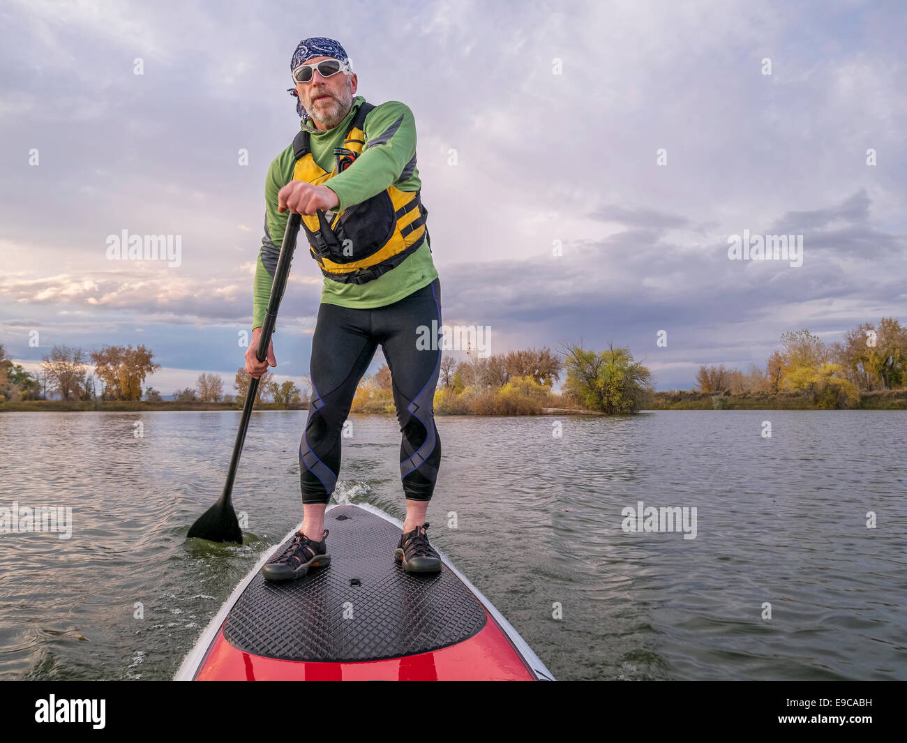 Senior paddler paddling stand hi-res stock photography and images - Alamy