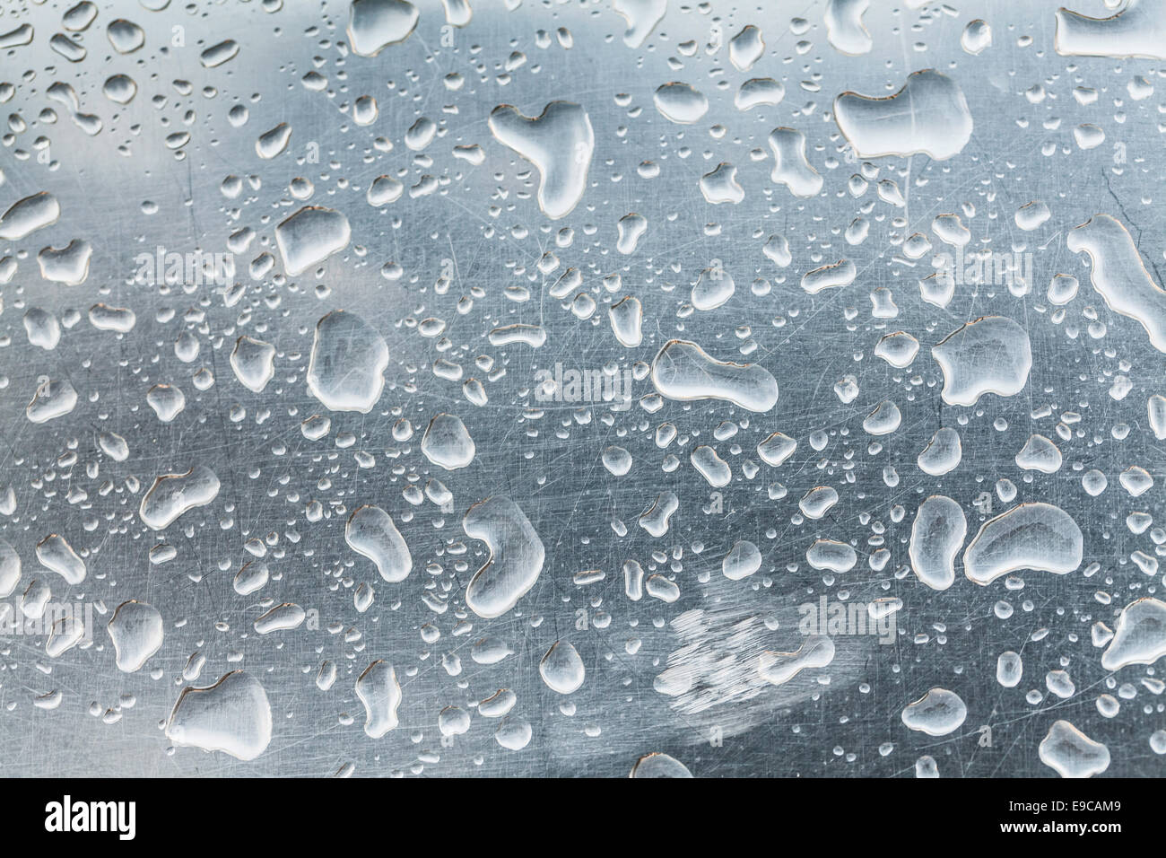 Metal surface covered in water drops bottom, closeup Stock Photo - Alamy