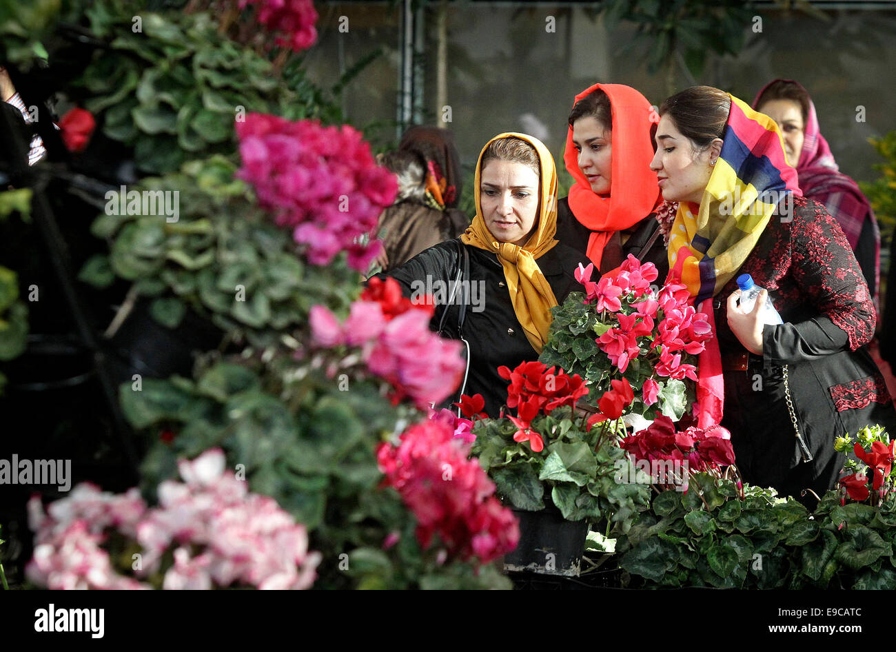 Tehran, Iran. 24th Oct, 2014. Iranian women visit the Autumn Flowers ...