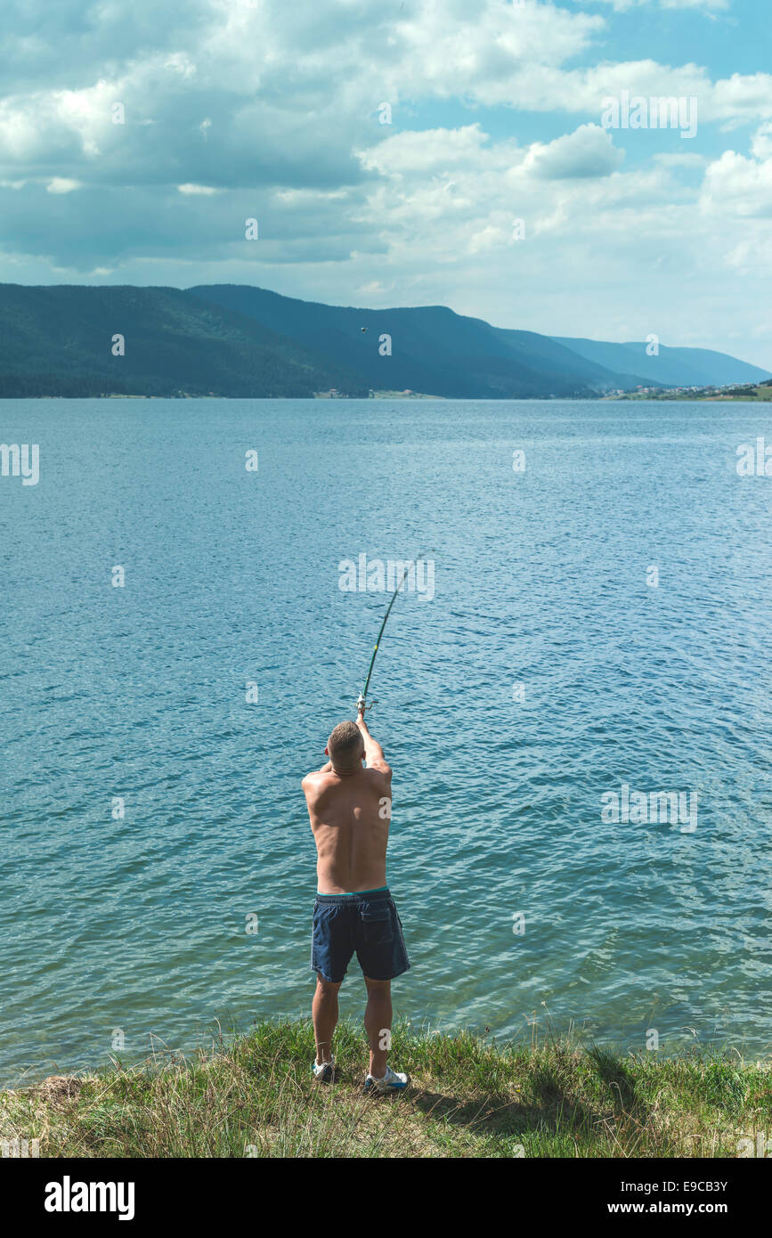 Man with fishing rod hi-res stock photography and images - Alamy
