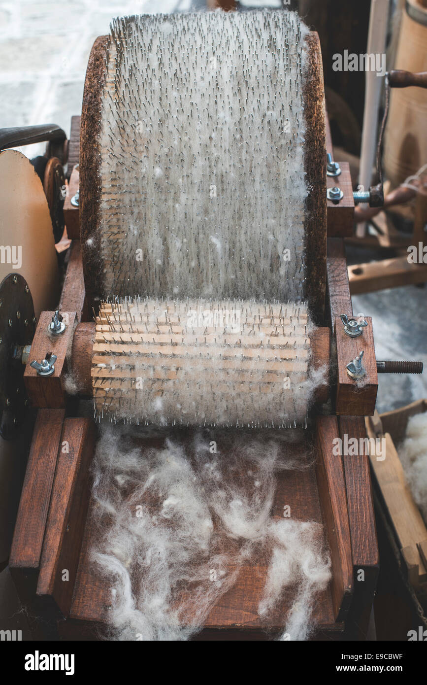Manual processing of wool Stock Photo - Alamy