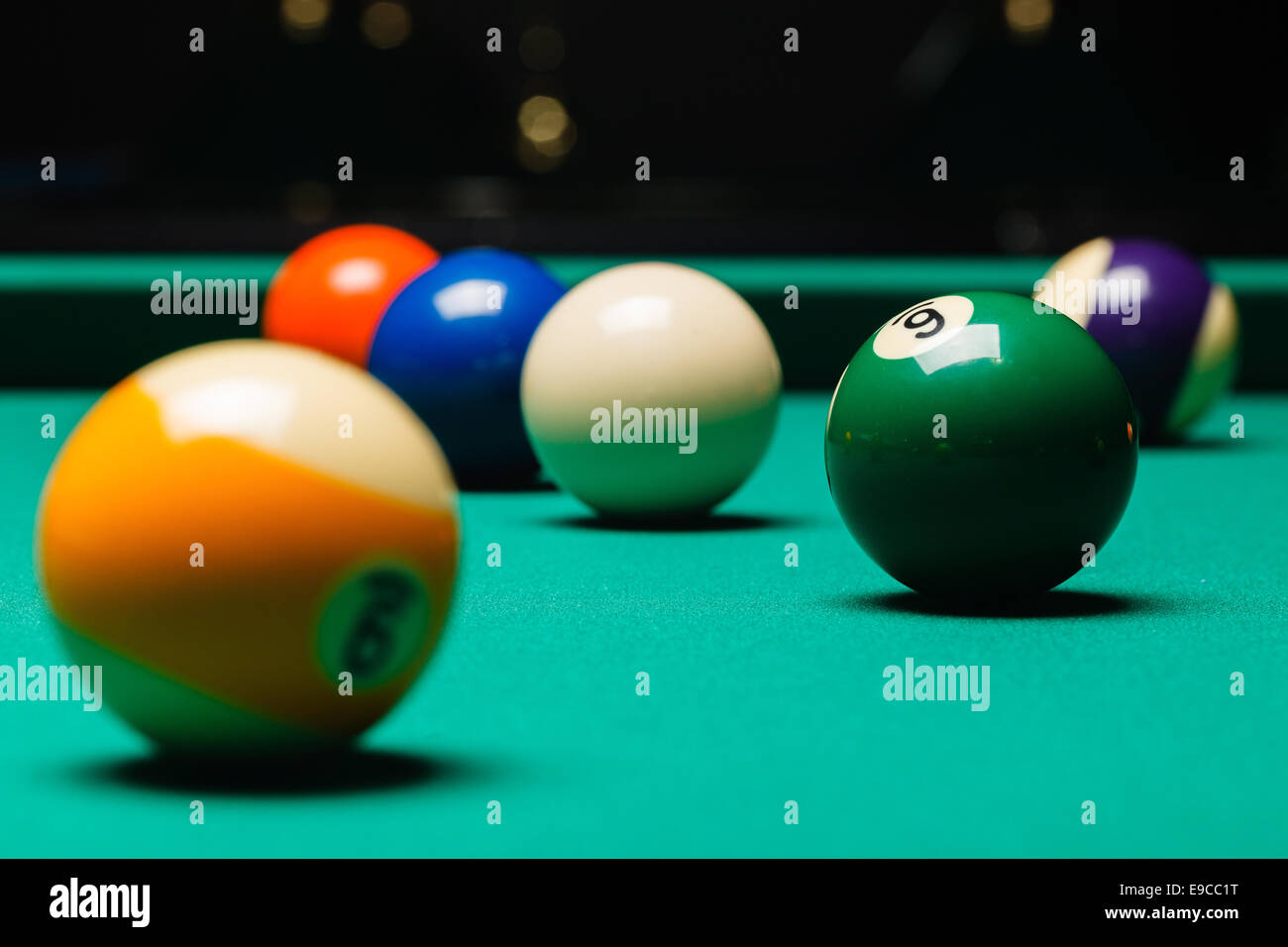 Billiard balls in a pool table Stock Photo - Alamy