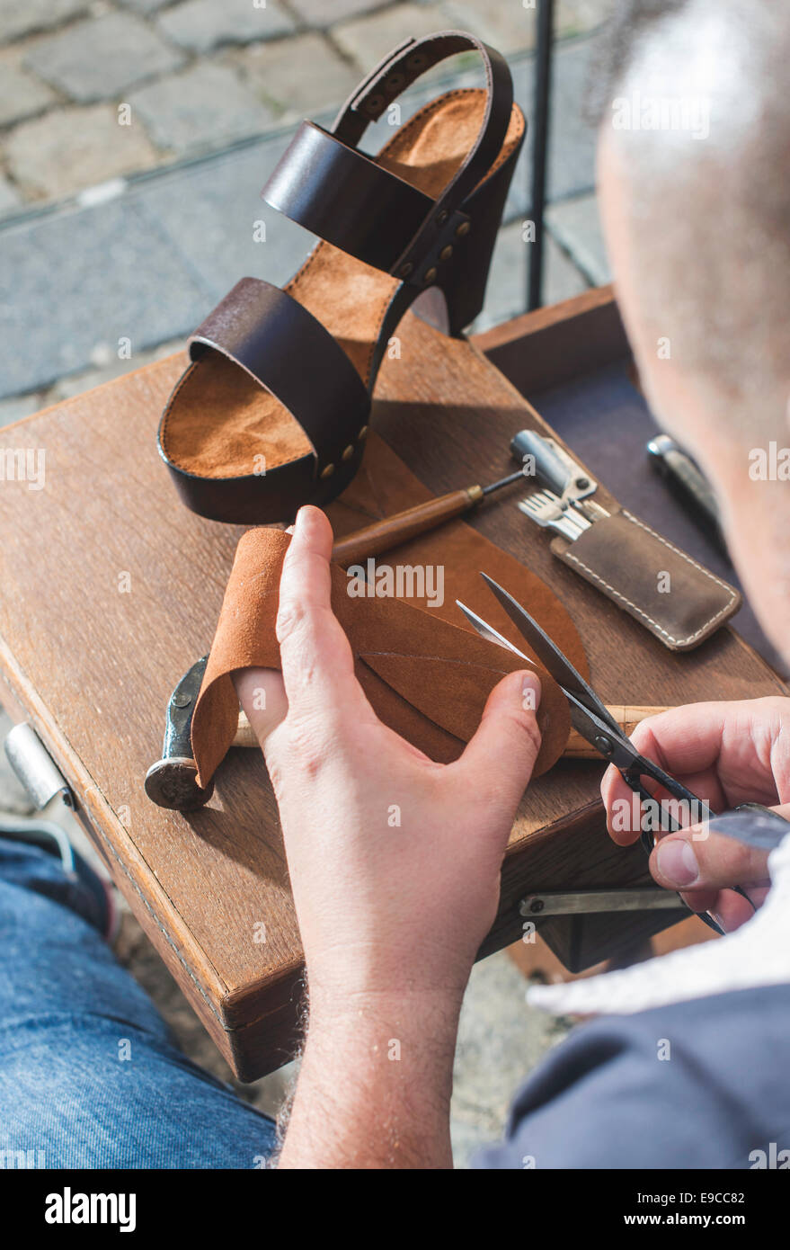 Shoemaker hi-res stock photography and images - Alamy
