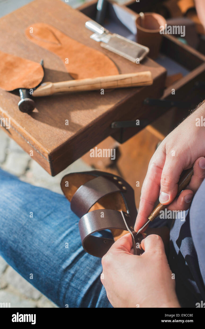 Hands making shoes. Shoemaker Stock Photo - Alamy