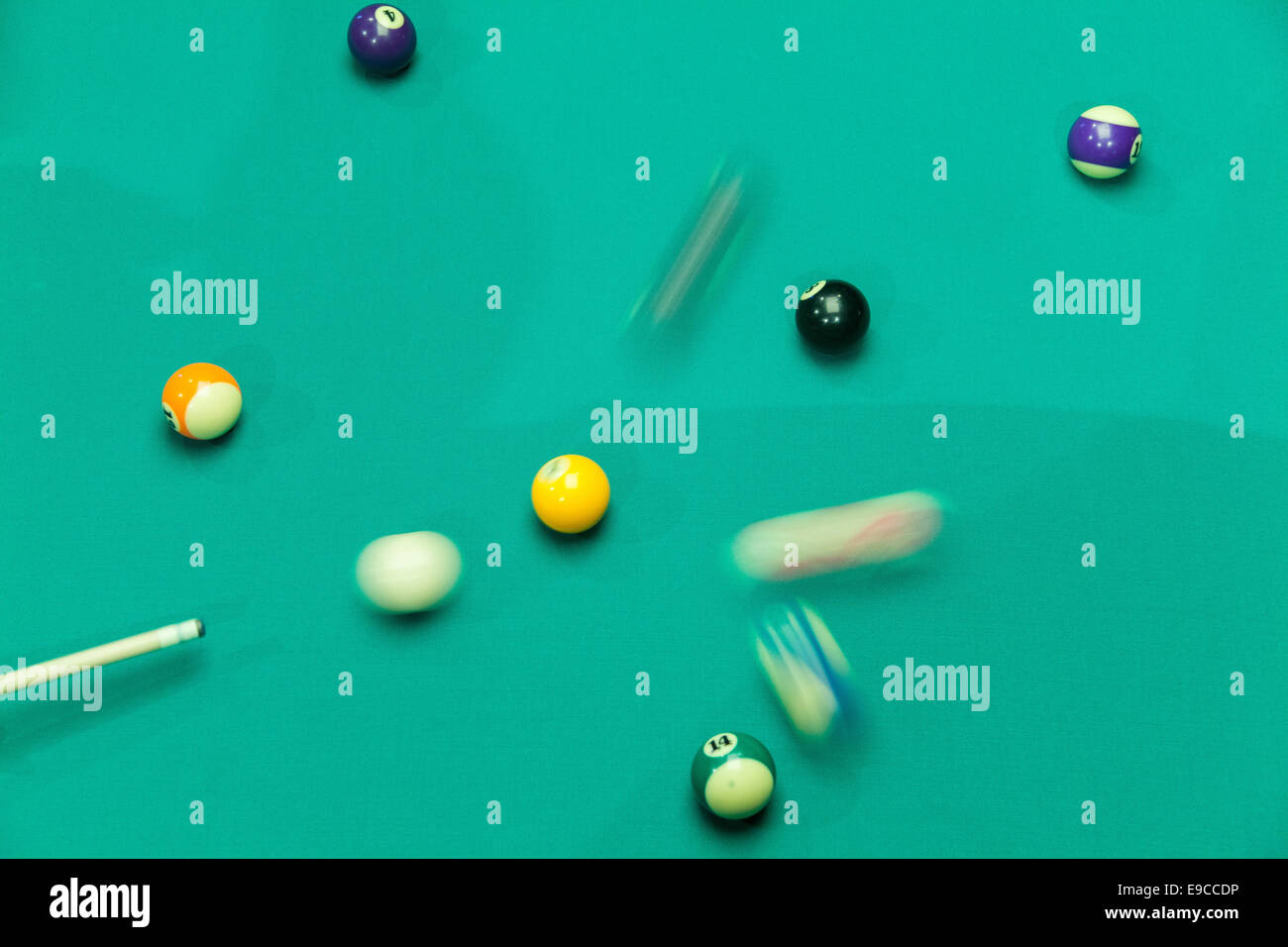 Breaking Pool Balls on green table Stock Photo - Alamy