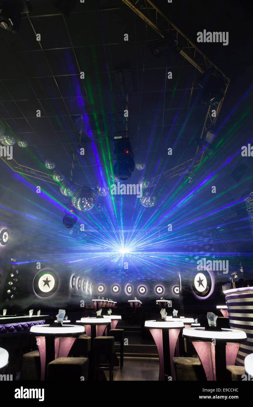 Disco light show, Stage lights with laser Stock Photo - Alamy