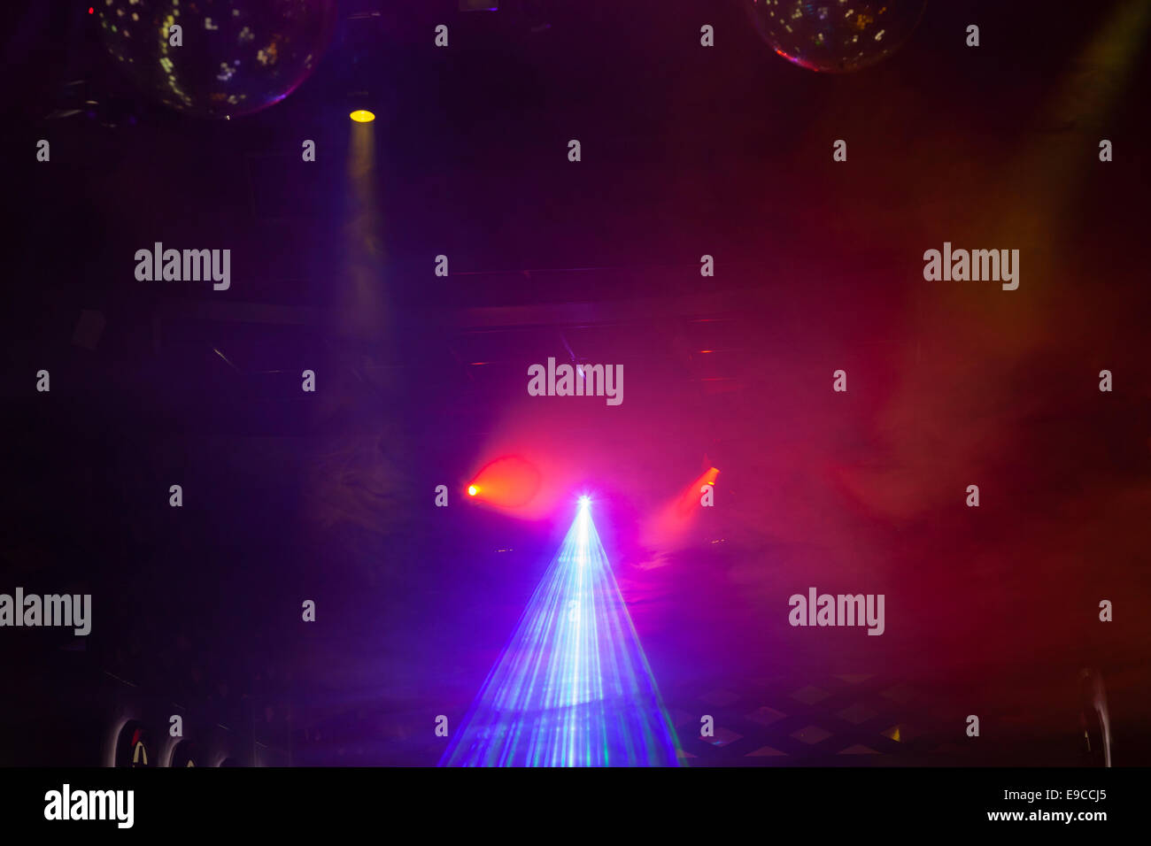 Disco light show, Stage lights with laser Stock Photo - Alamy