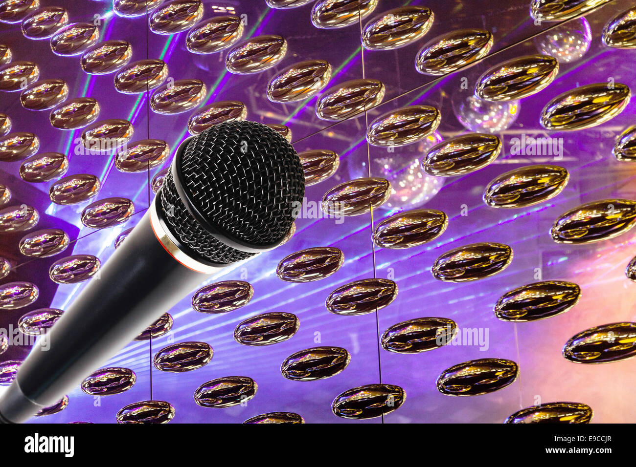 Stylish microphone isolated on colored background Stock Photo - Alamy