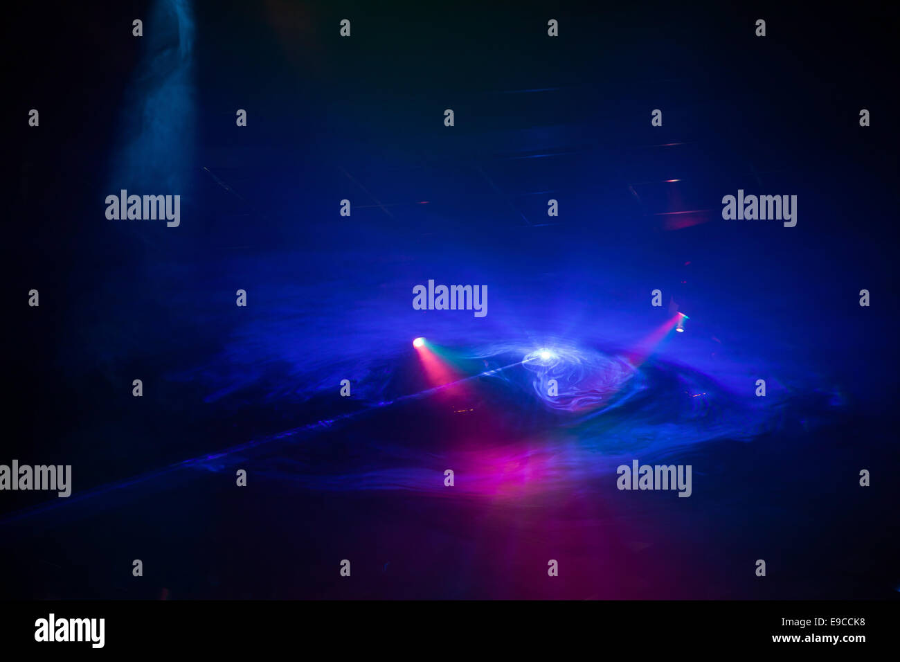 Disco light show, Stage lights with laser Stock Photo - Alamy