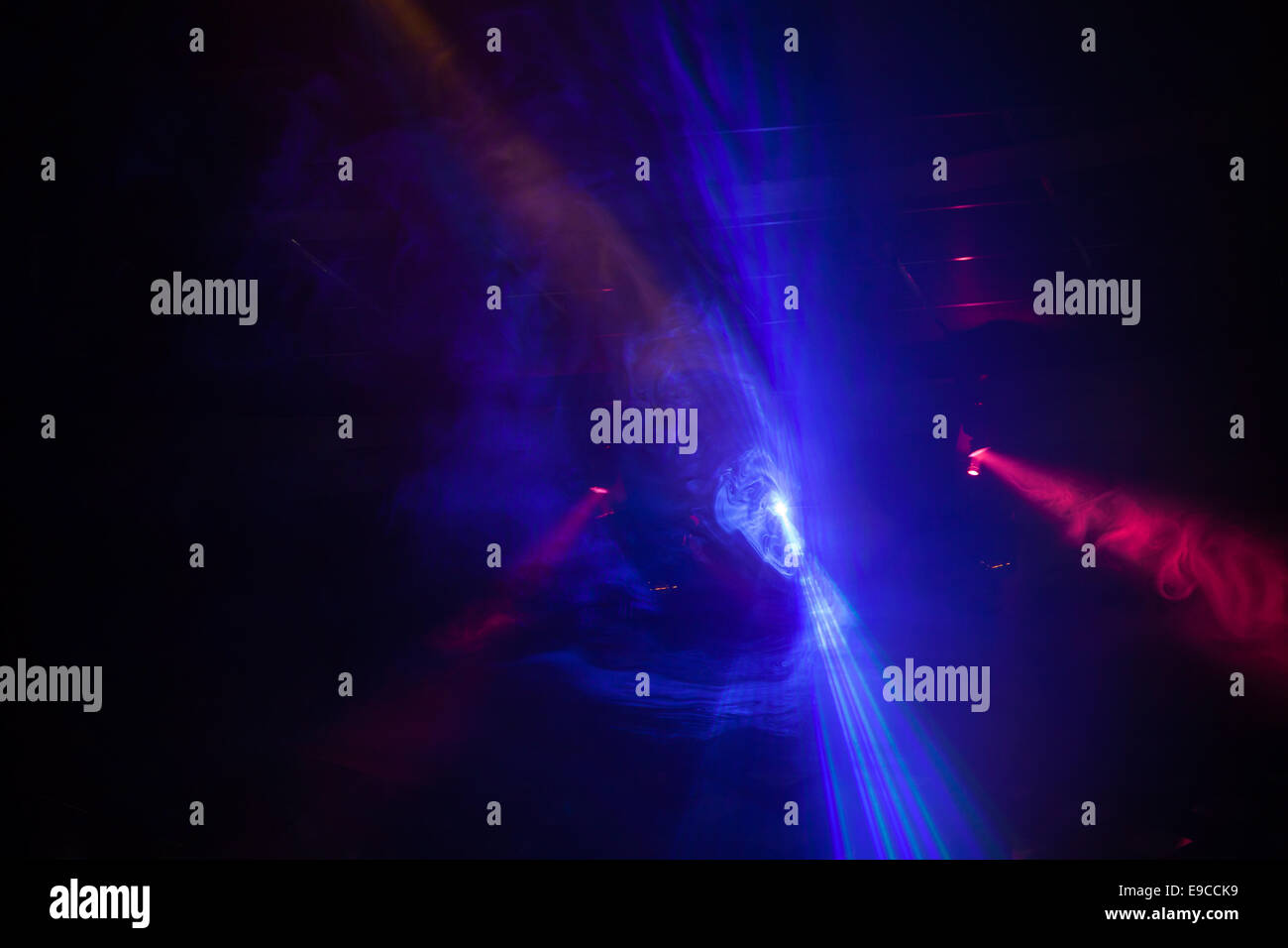 Disco light show, Stage lights with laser Stock Photo - Alamy