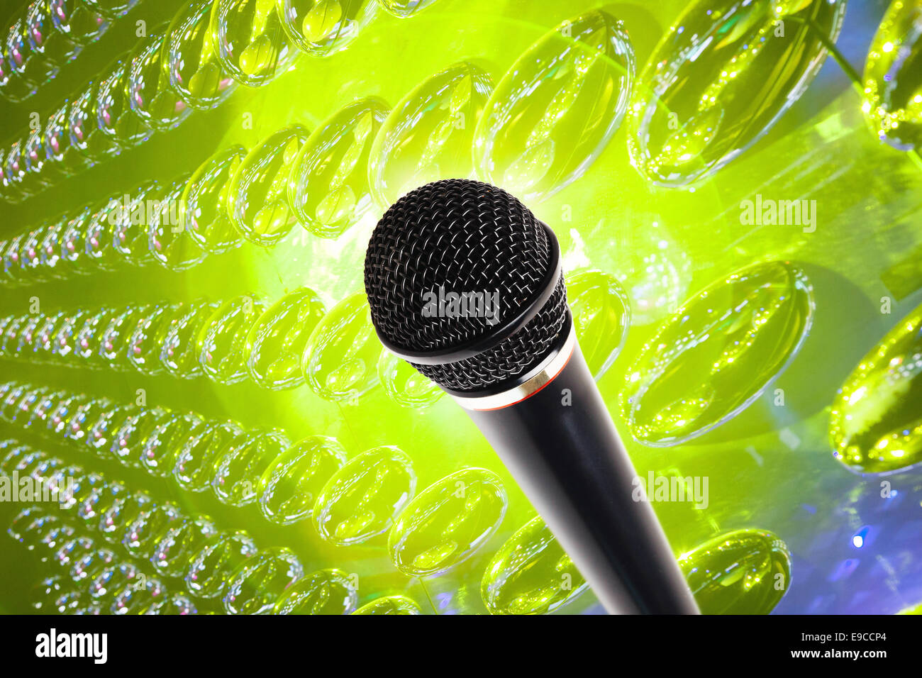 Stylish microphone isolated on colored background Stock Photo - Alamy