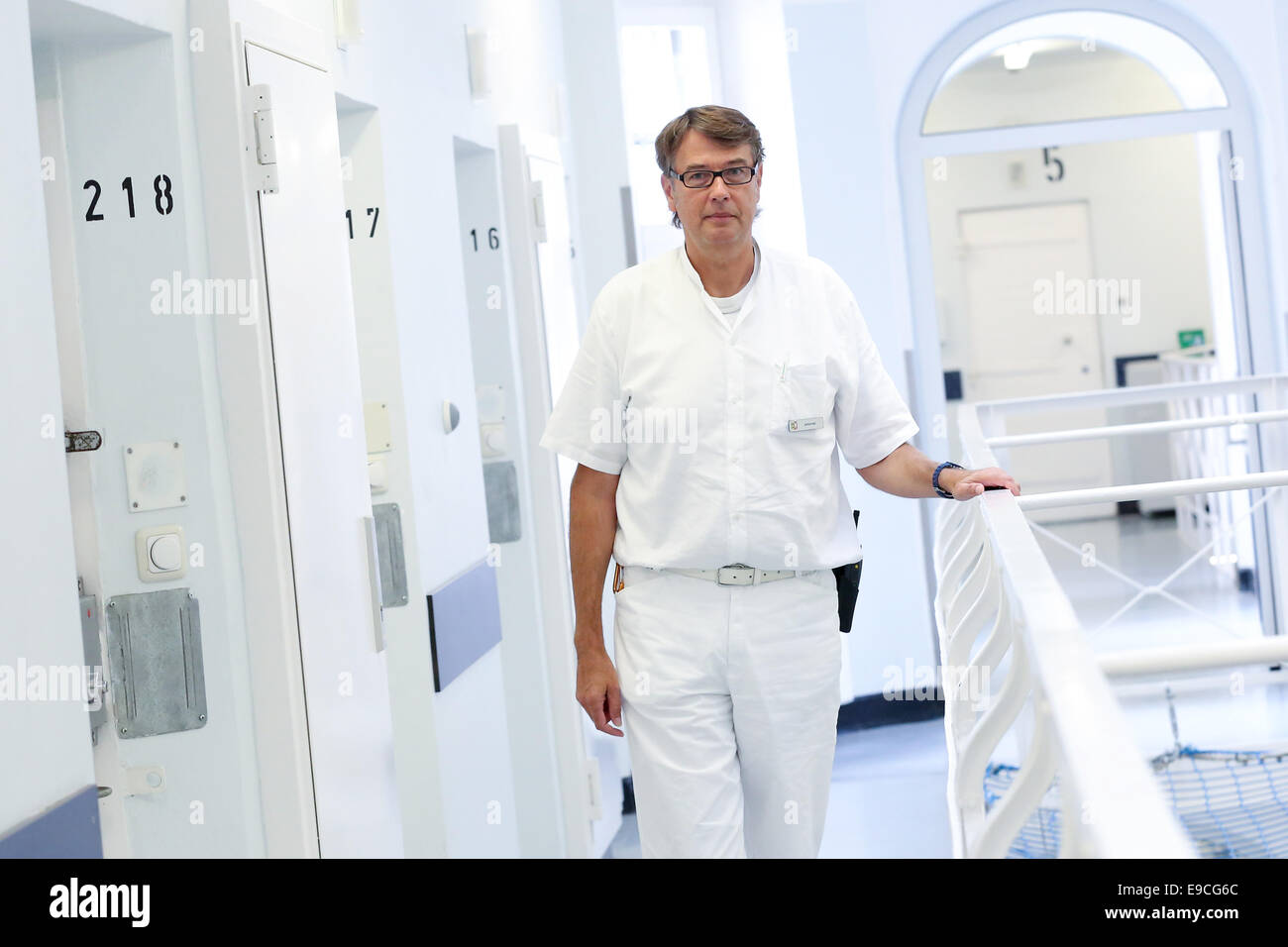 Kiel, Germany. 22nd Oct, 2014. Prison doctor Thomas Jedamski stands in ...