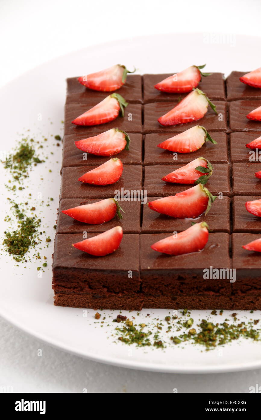 A piece of chocolate cake with strawberry Stock Photo - Alamy