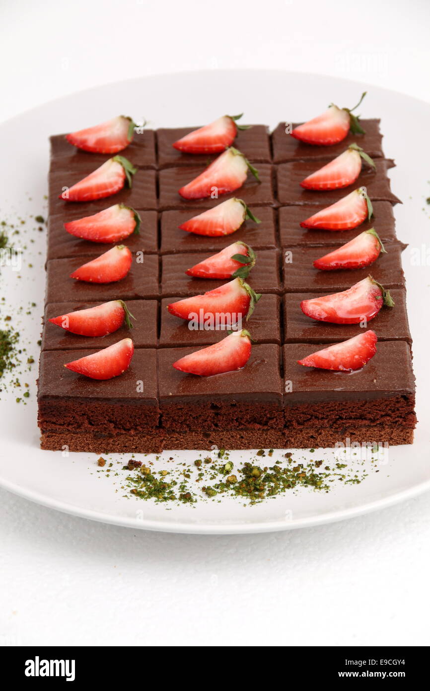 A piece of chocolate cake with strawberry Stock Photo - Alamy