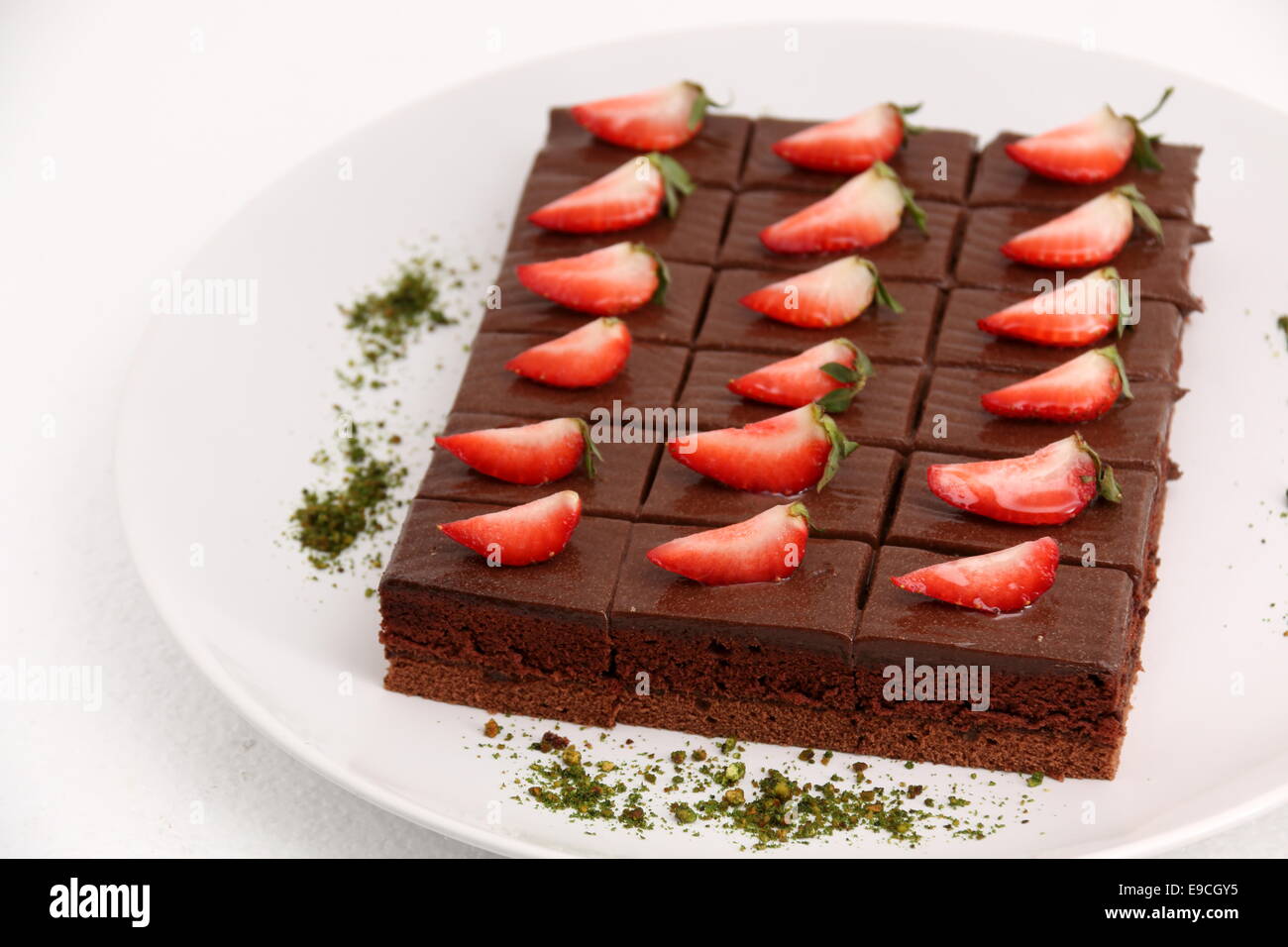 A piece of chocolate cake with strawberry Stock Photo - Alamy