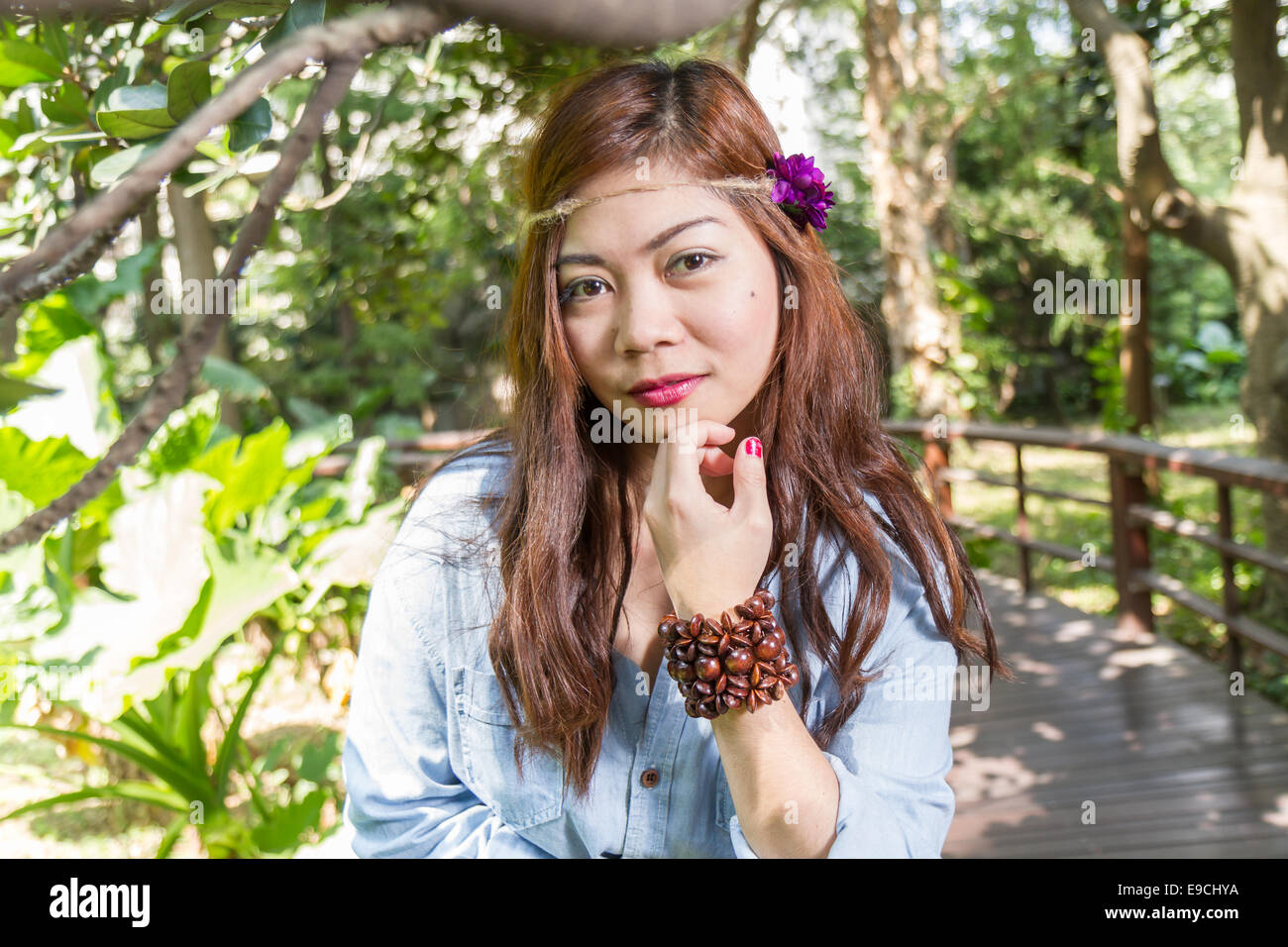 Pinoy woman in a green garden on farm Stock Photo - Alamy