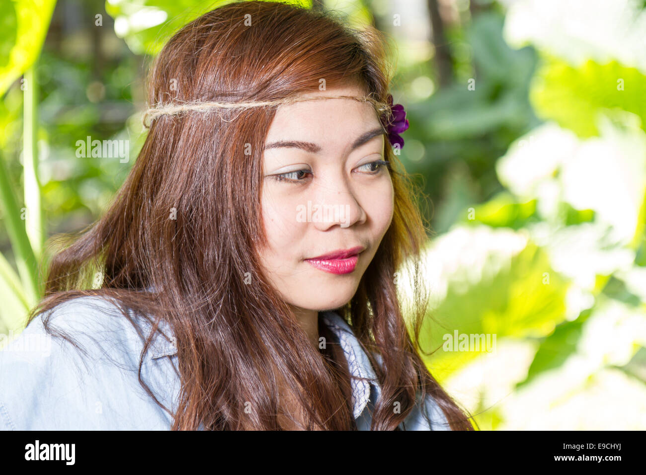 Pinoy woman in a green garden on farm Stock Photo - Alamy