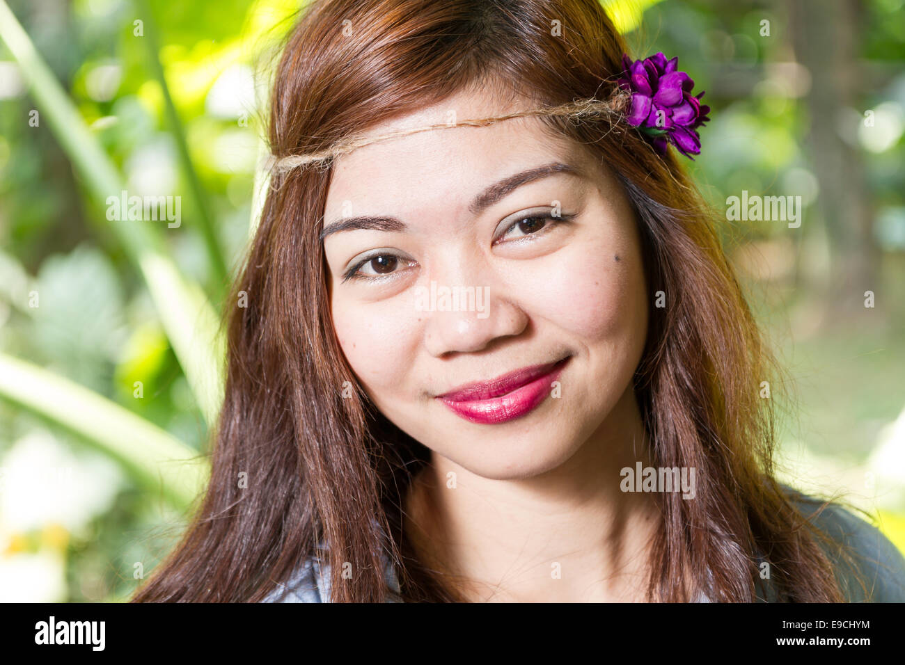 Pinoy woman in a green garden on farm Stock Photo - Alamy