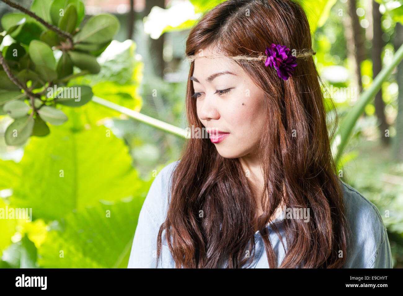 Pinoy woman in a green garden on farm Stock Photo - Alamy