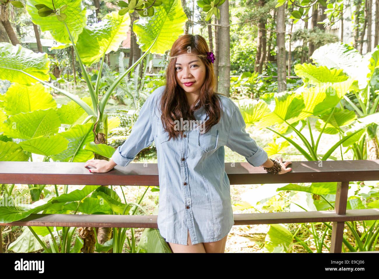 Pinoy woman in a green garden on farm Stock Photo - Alamy