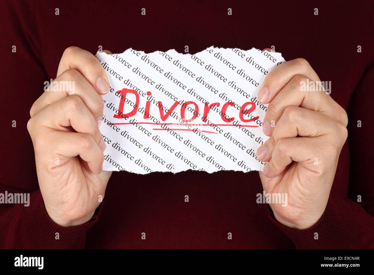 Piece of paper with red word "Divorce" on background with words ...