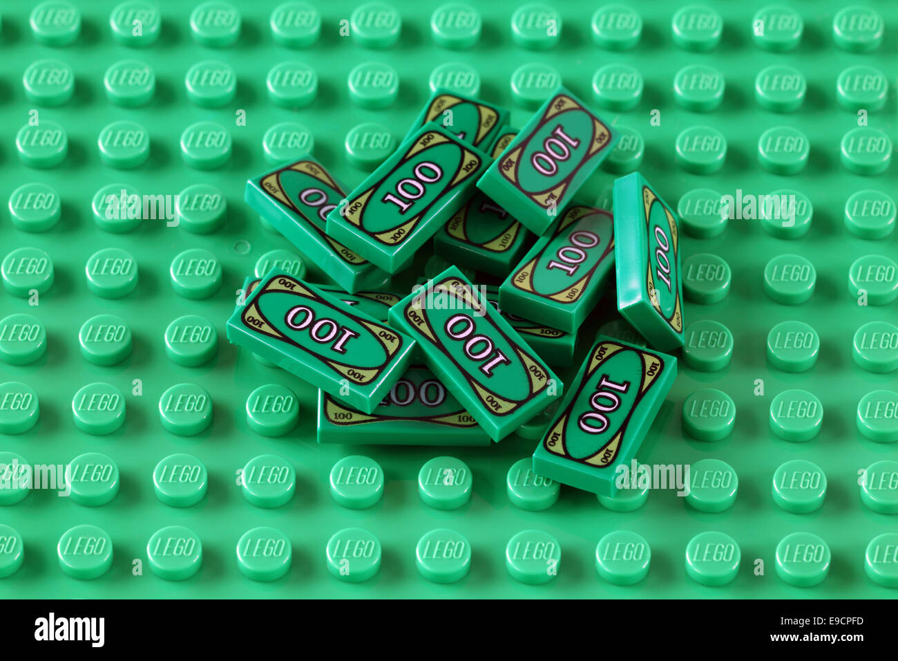 Tambov, Russian Federation - May 08, 2013 LEGO money blocks on a green ...