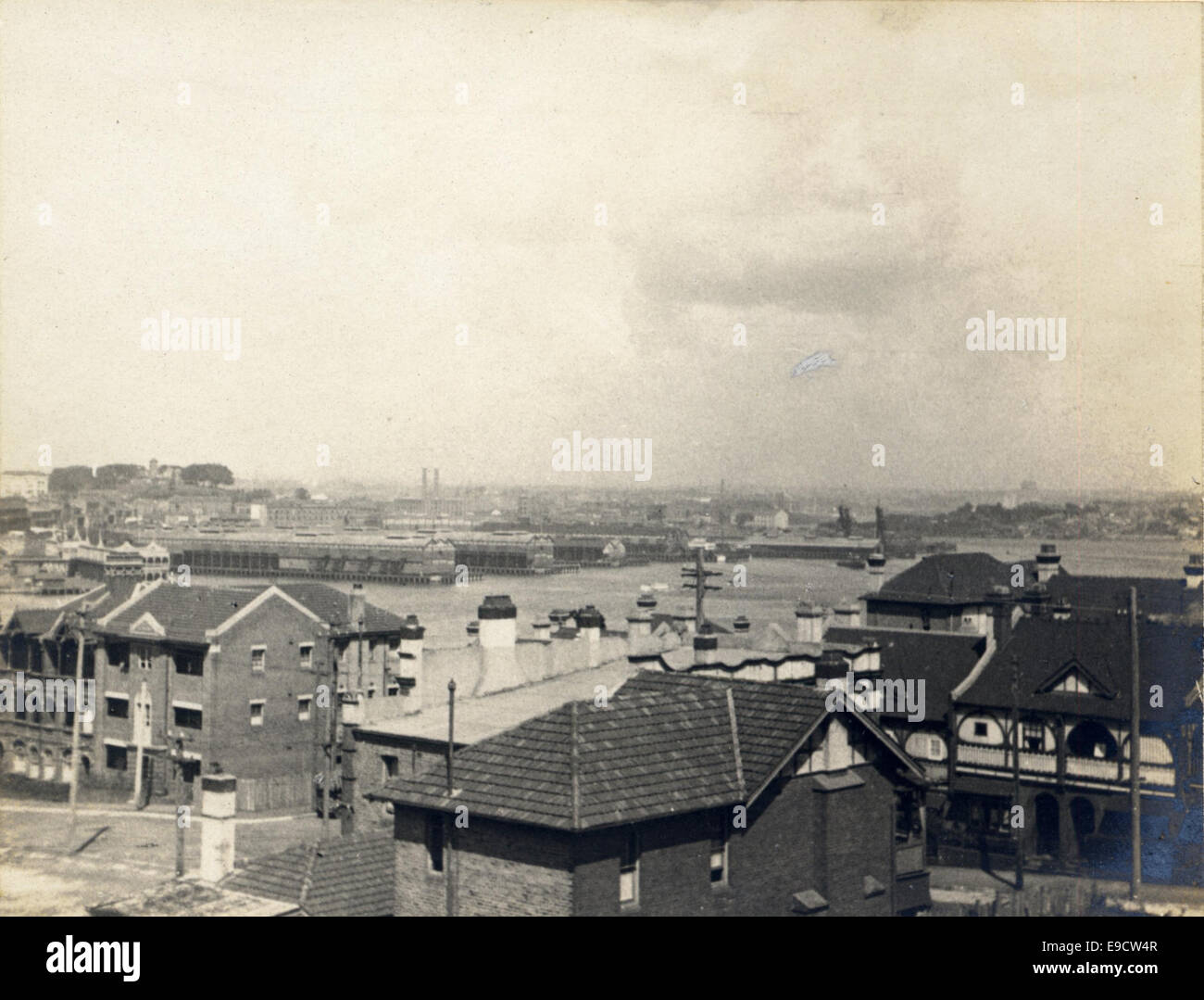A photograph taken from the bridge, offering a view of Darling Harbour ...