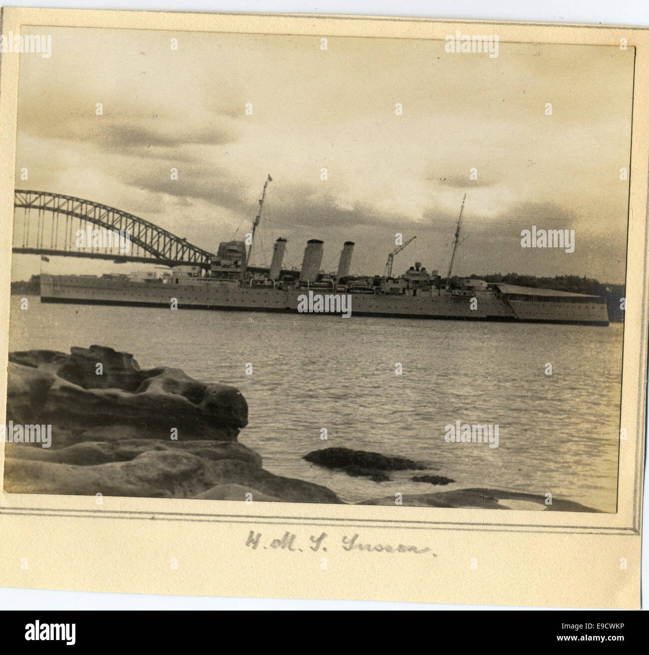 This image shows the HMS Sussex, a British warship. The photograph ...