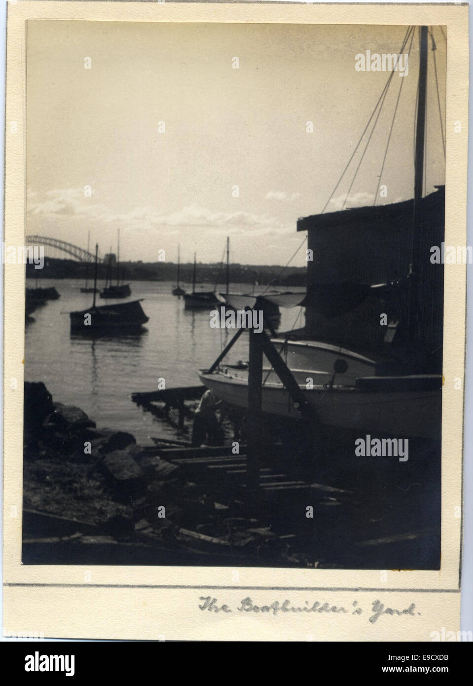 Photograph showing the boatbuilder's yard, a workshop where boats are ...