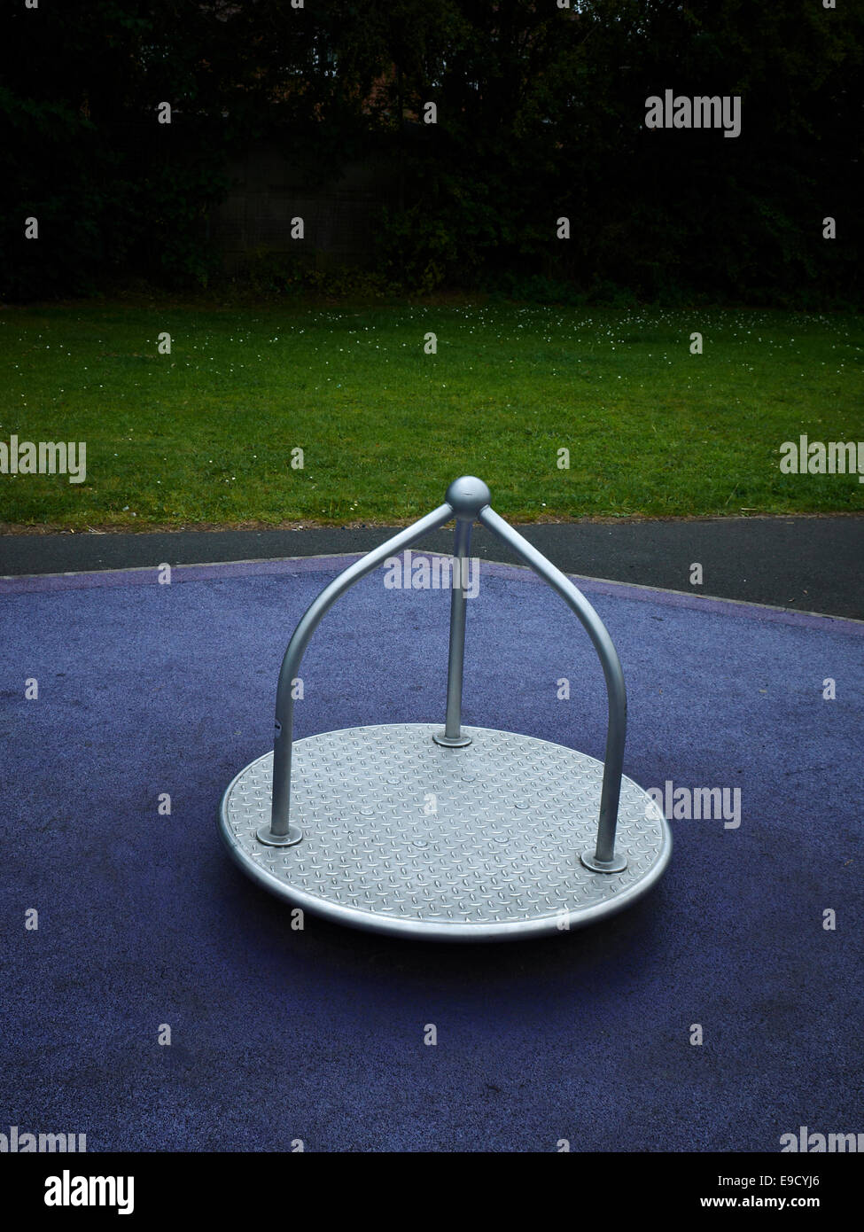 Carousel in children`s playgound UK Stock Photo - Alamy