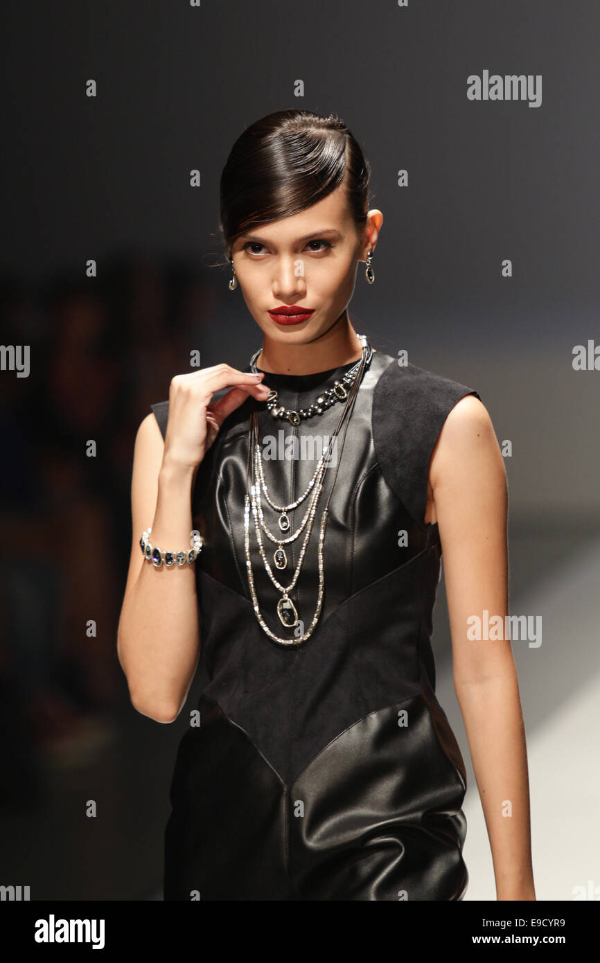 Pasay City, Phillippine. 24th Oct, 2014. A model presents a creation of ...
