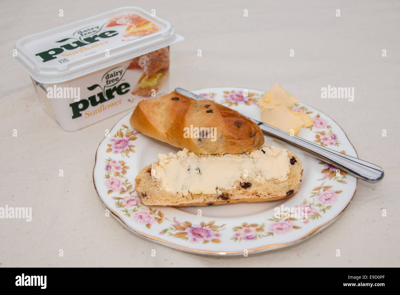 Pure spread, with a bread bun on a retro plate [1 of 6] Stock Photo - Alamy