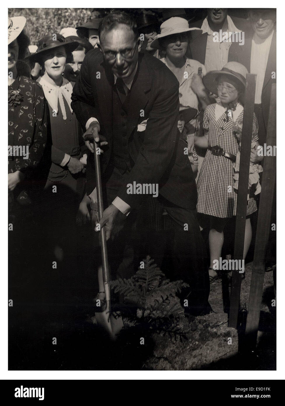 A photograph documenting the tree planting ceremony at Camp Cove ...