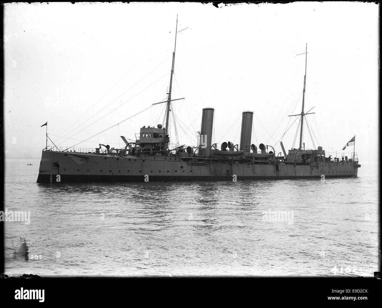 This photograph shows HMCS Rainbow, a Royal Canadian Navy warship that ...