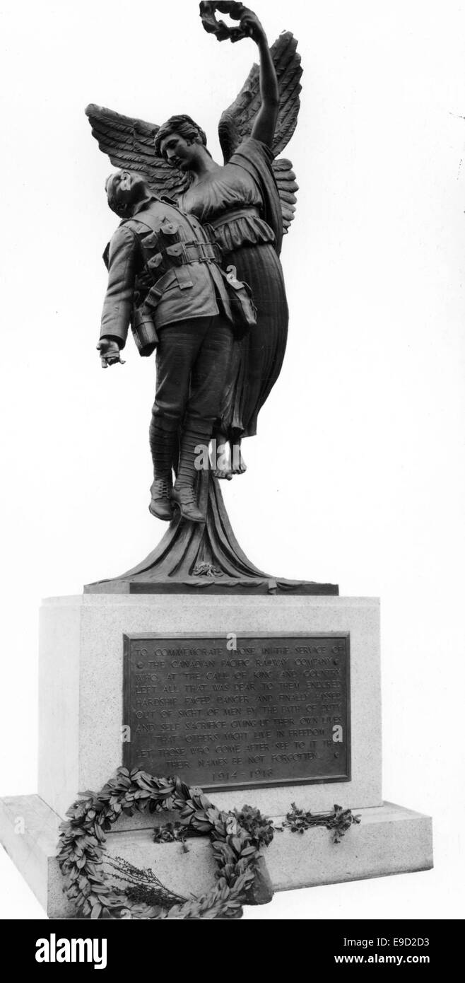 This photograph depicts a Veteran's Monument, commemorating the service ...
