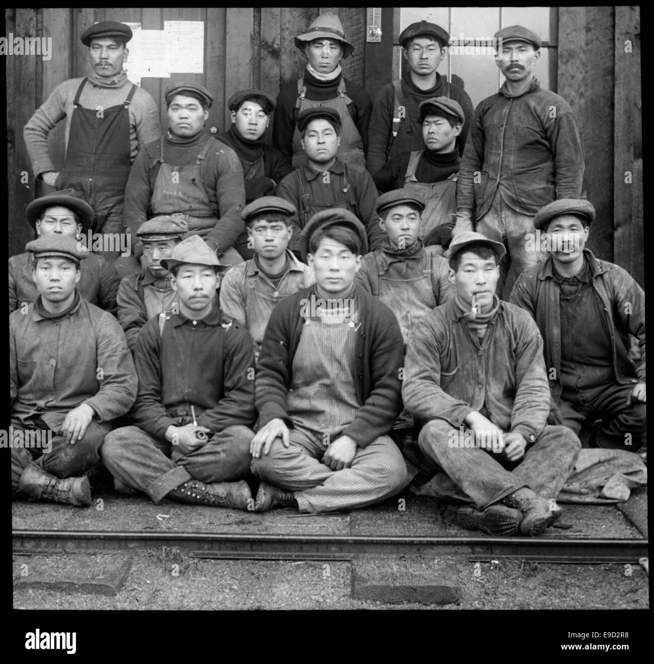 A photograph depicting a Chinese work crew in an unidentified location ...