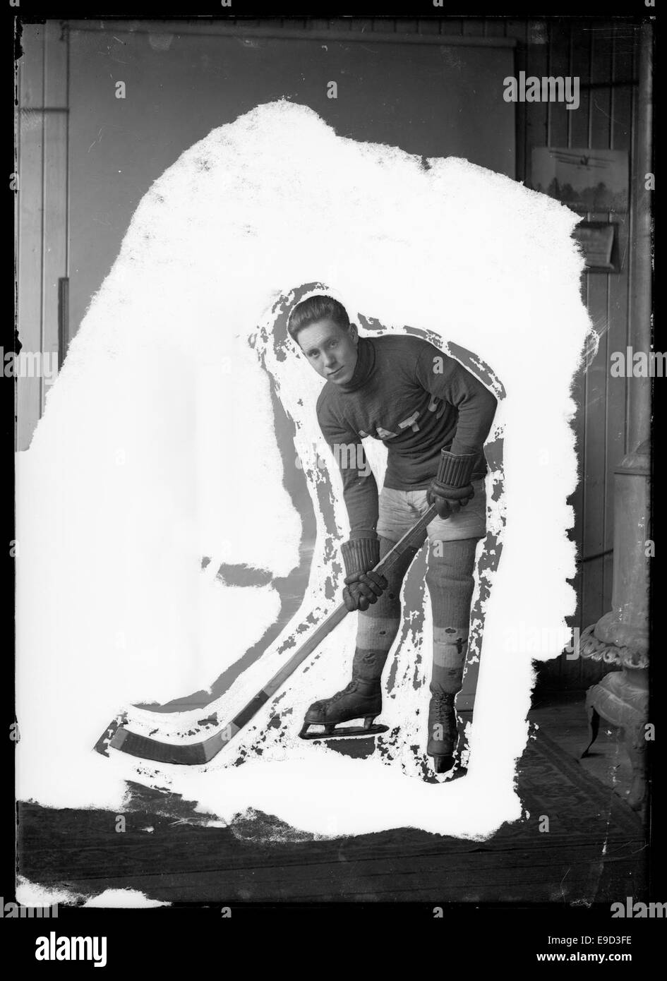 This photograph features a Vancouver hockey player, showcasing an ...