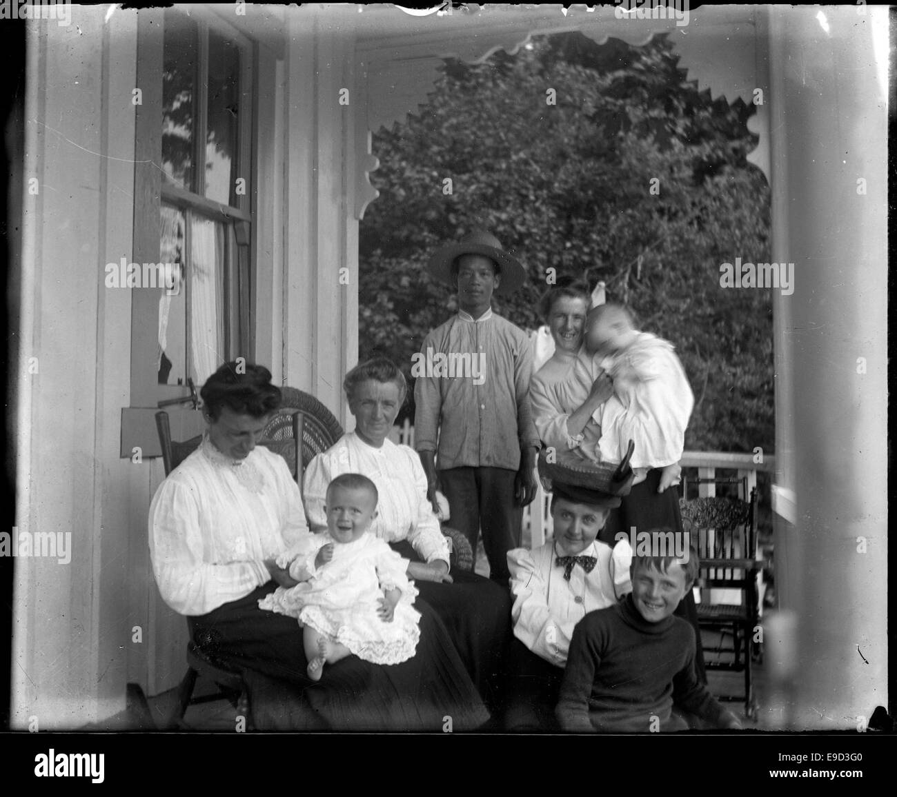 This historical family portrait shows a family with their Chinese ...