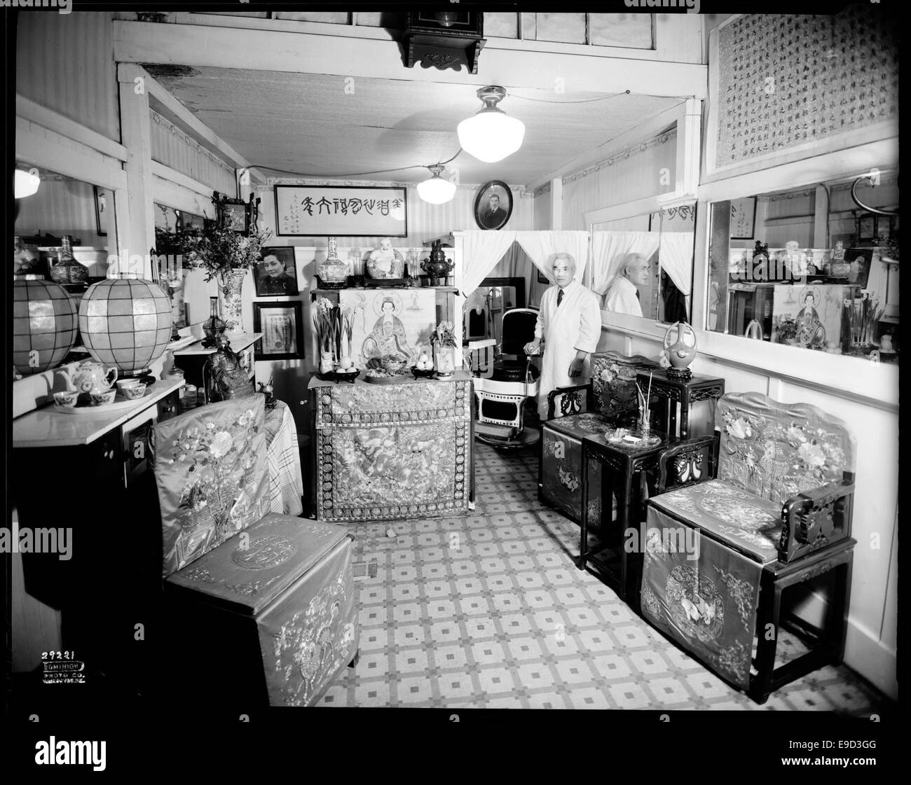 A historical photograph of the Soon Town Barber Shop, depicting the ...